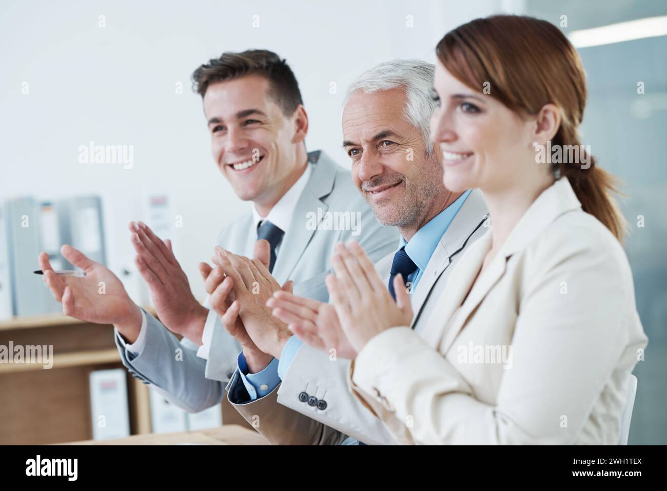 Business people, applause and support for success with praise and audience at presentation or ...