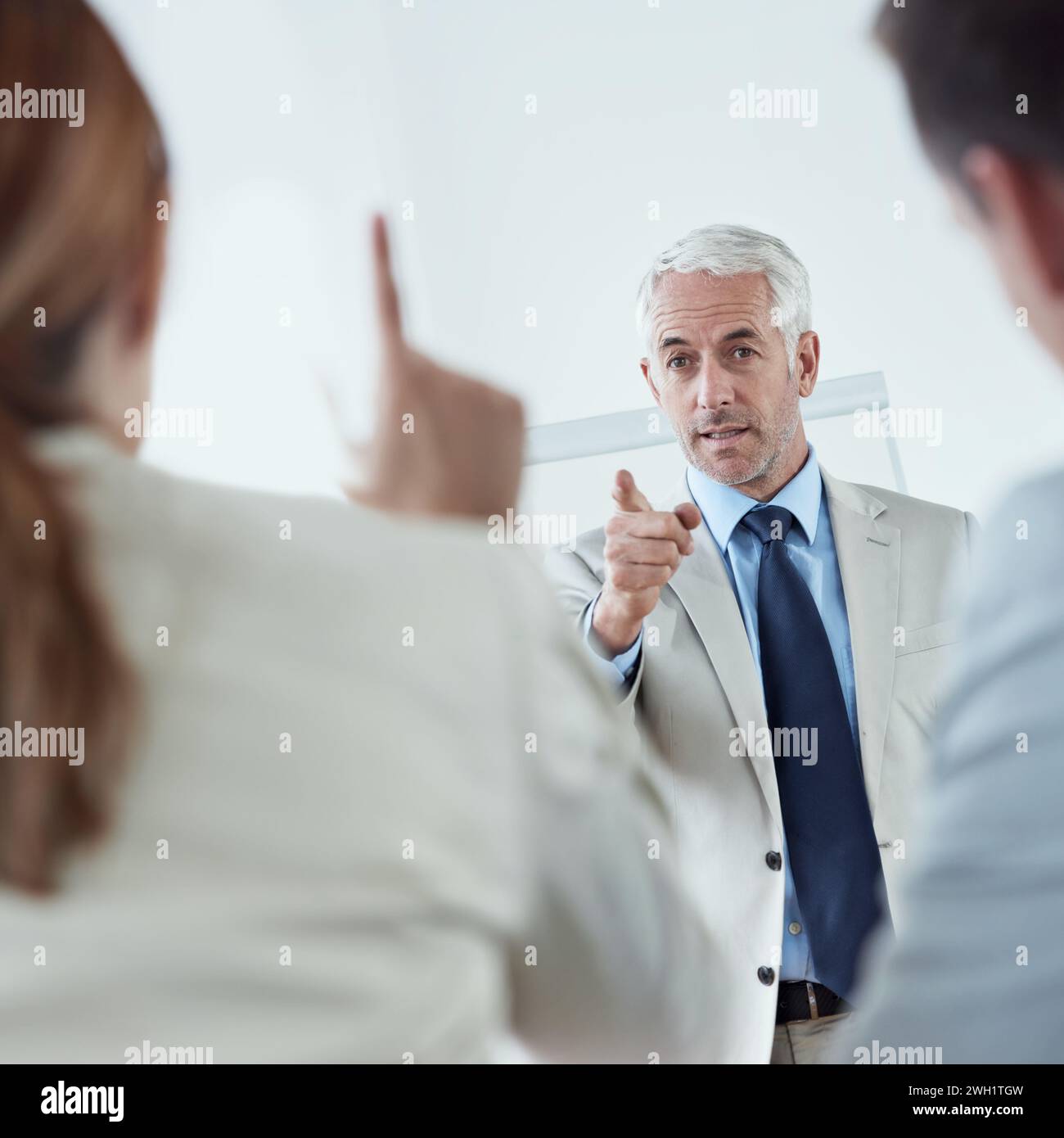 Mature man confused presentation hi-res stock photography and images ...
