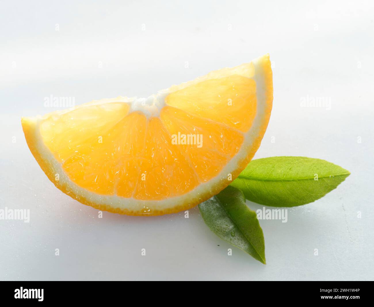 Wedge of orange Stock Photo - Alamy