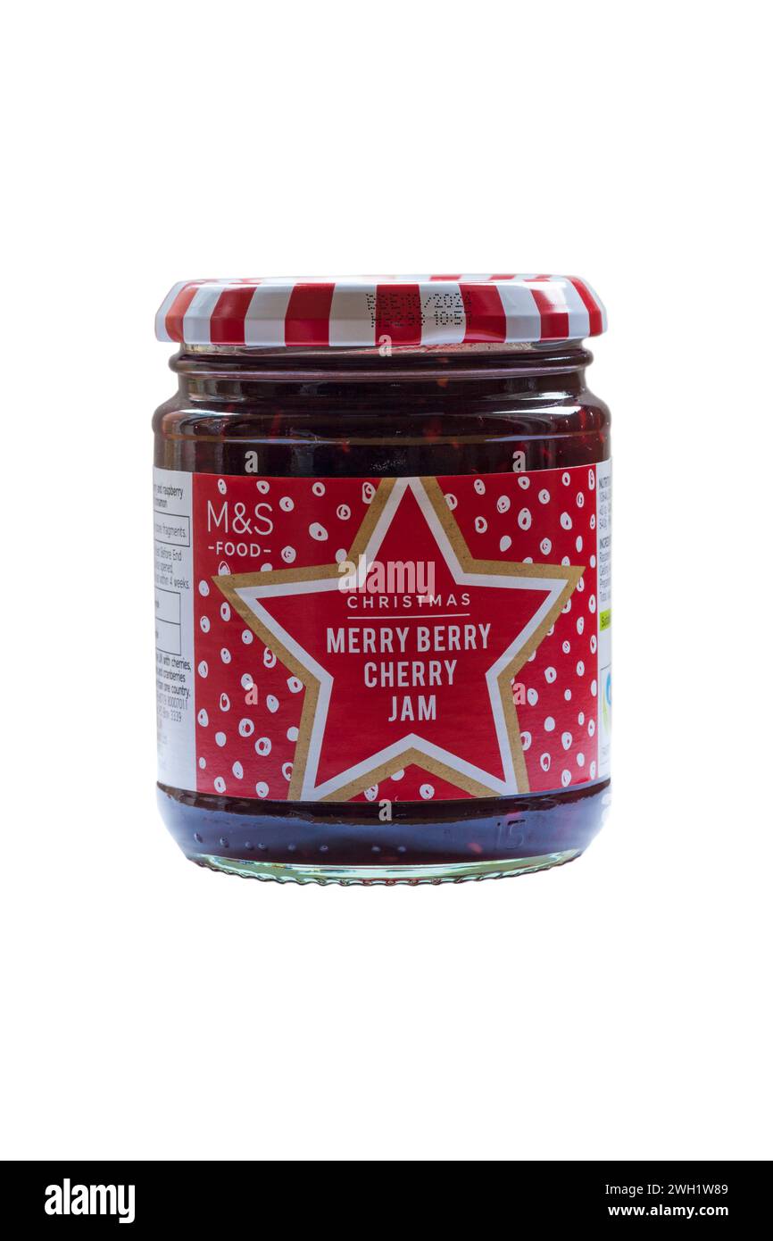 Jar of Christmas Merry Berry Cherry Jam from M&S isolated on white background - cranberry cherry ...