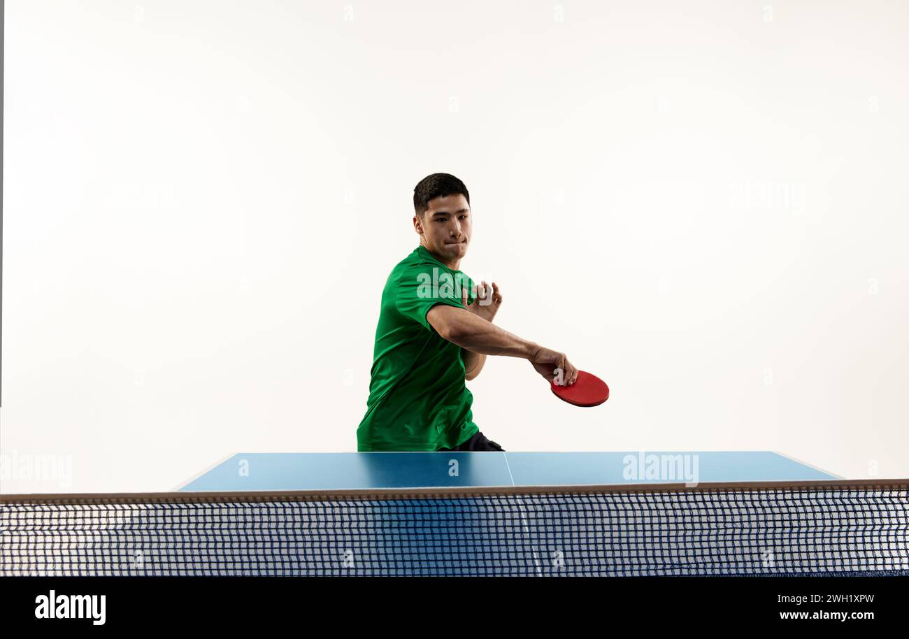 Dynamic portrait of athletic Asian man, professional ping-pong player ...