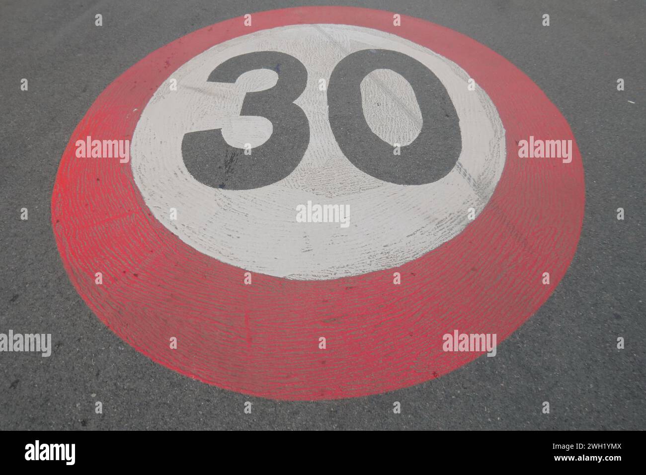 30 km per hour speed limit road sign Stock Photo - Alamy