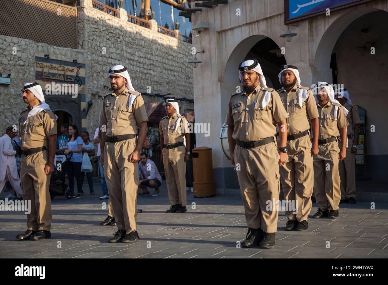 Doha, Qatar-December 16,2023 : Police in traditional dress on front of ...