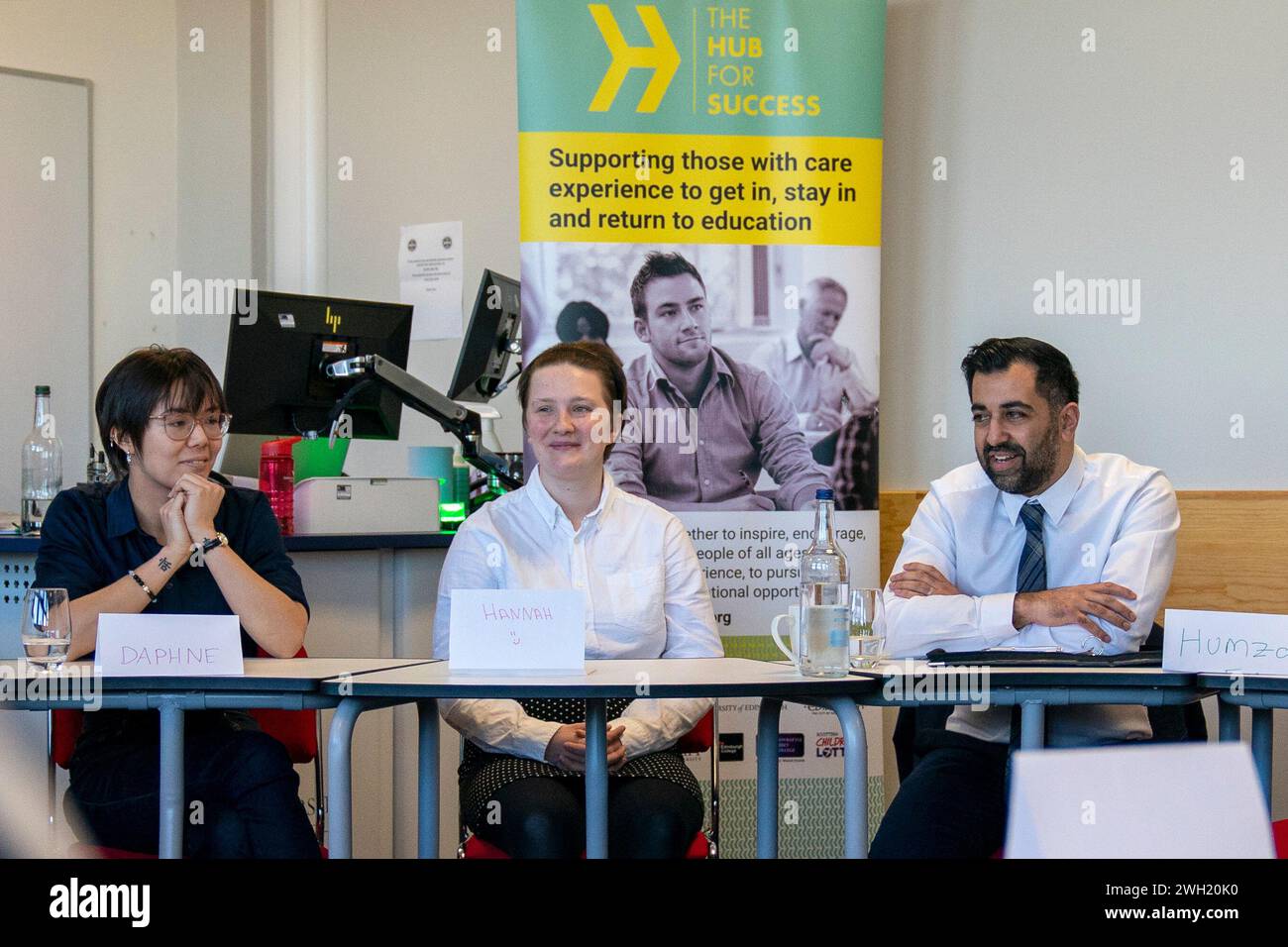 First Minister Humza Yousaf (right) meets students with experience of ...