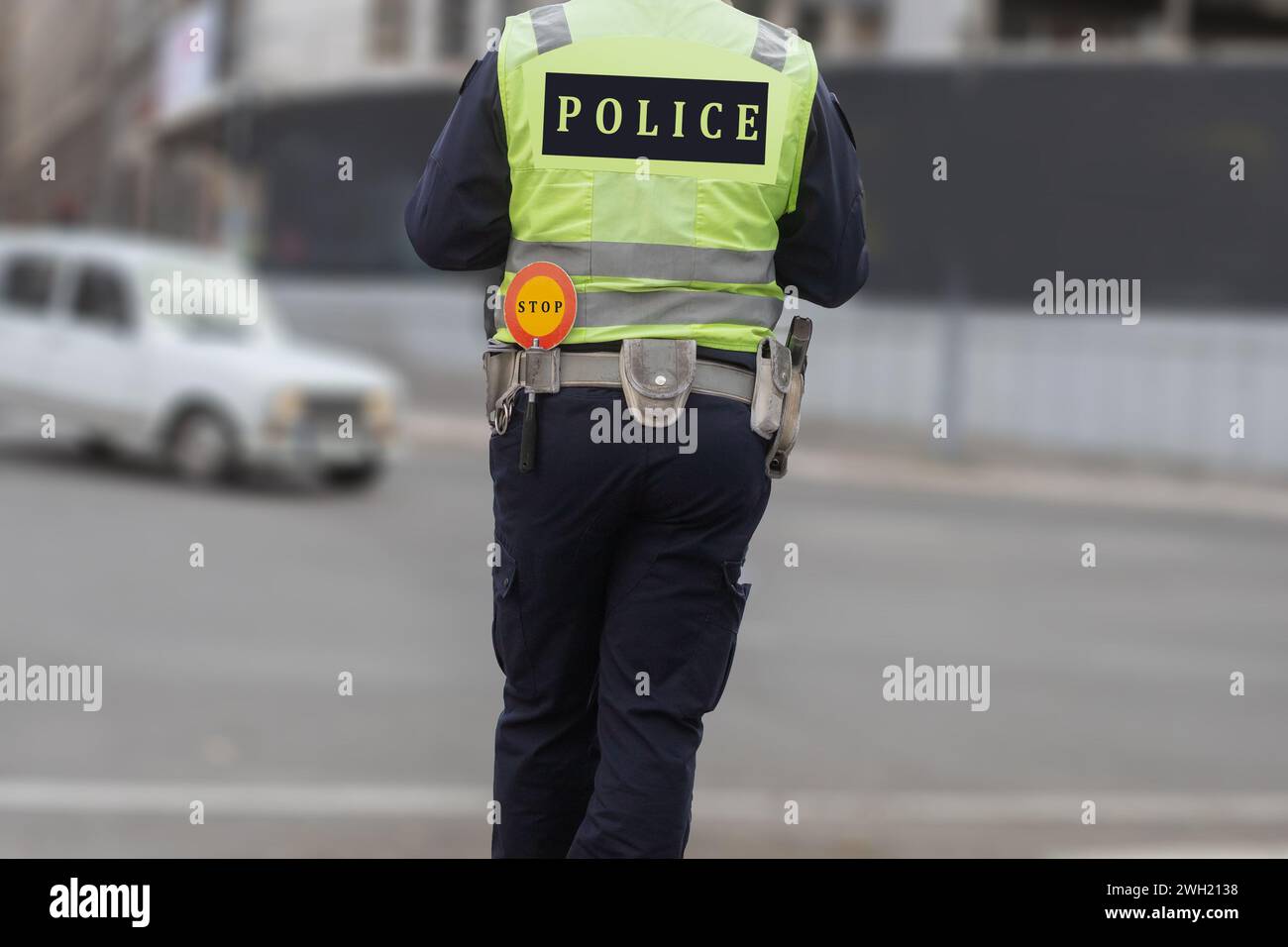 police officer's behind while organizing traffic Stock Photo - Alamy