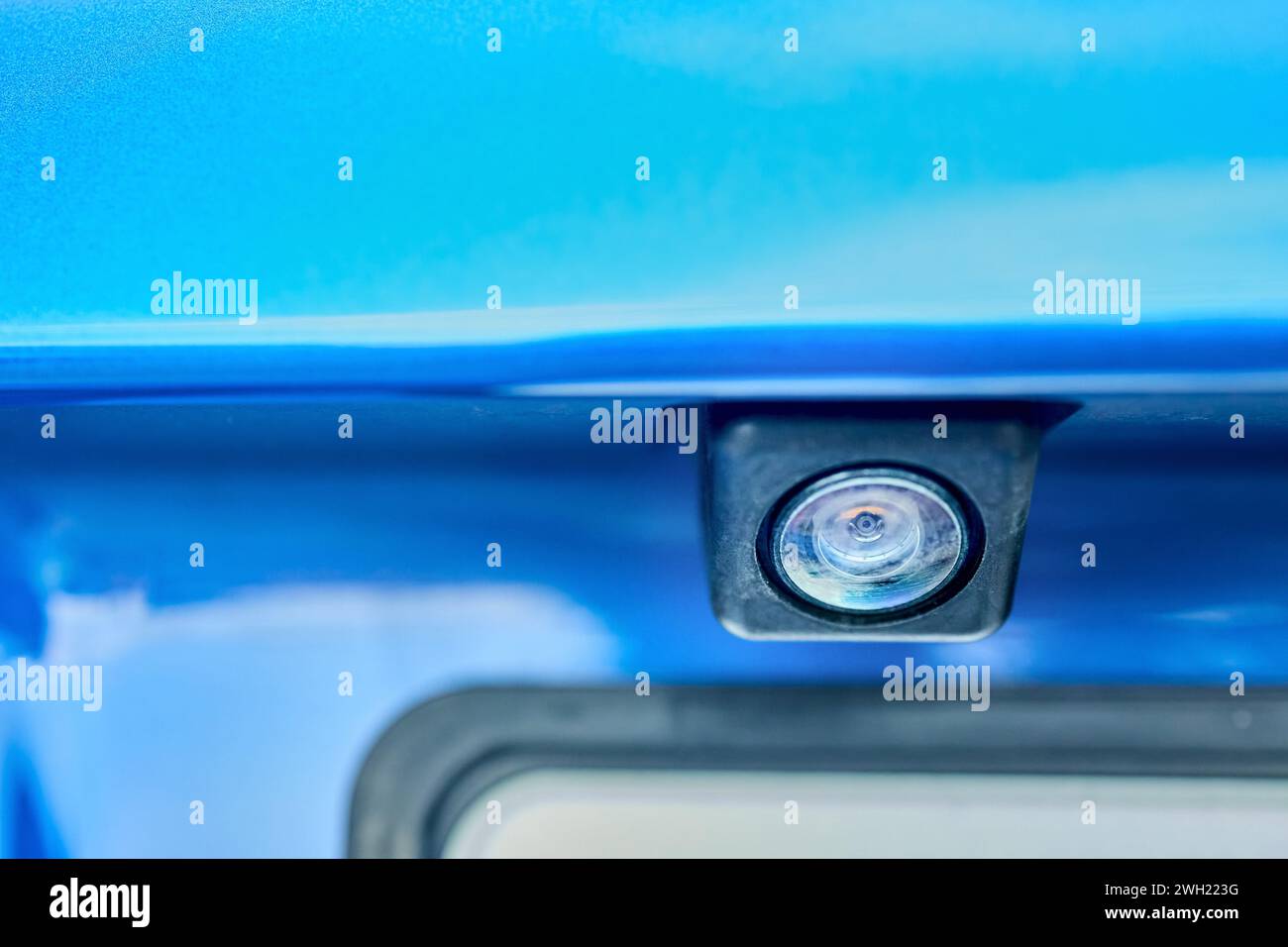 Luxury blue car rear view camera for parking assistance selective focus ...