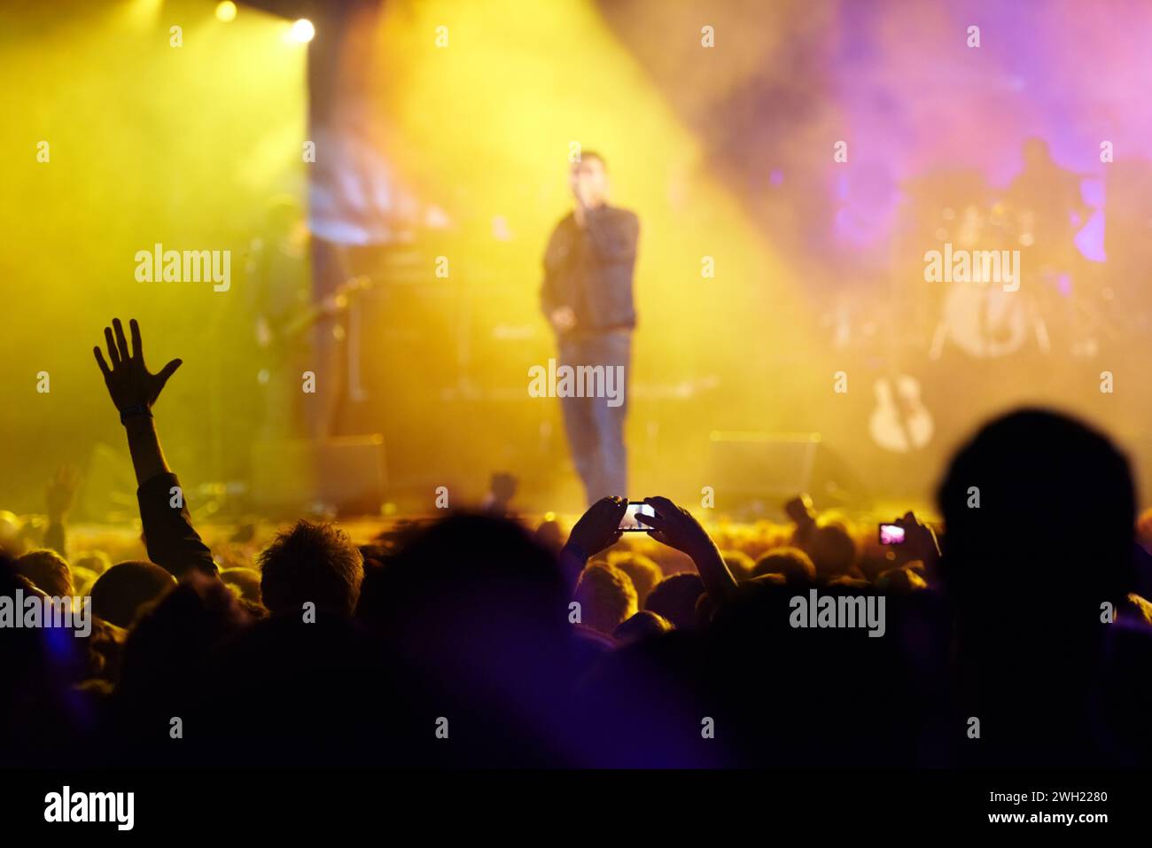 Concert, audience and hands in crowd with band for music festival ...