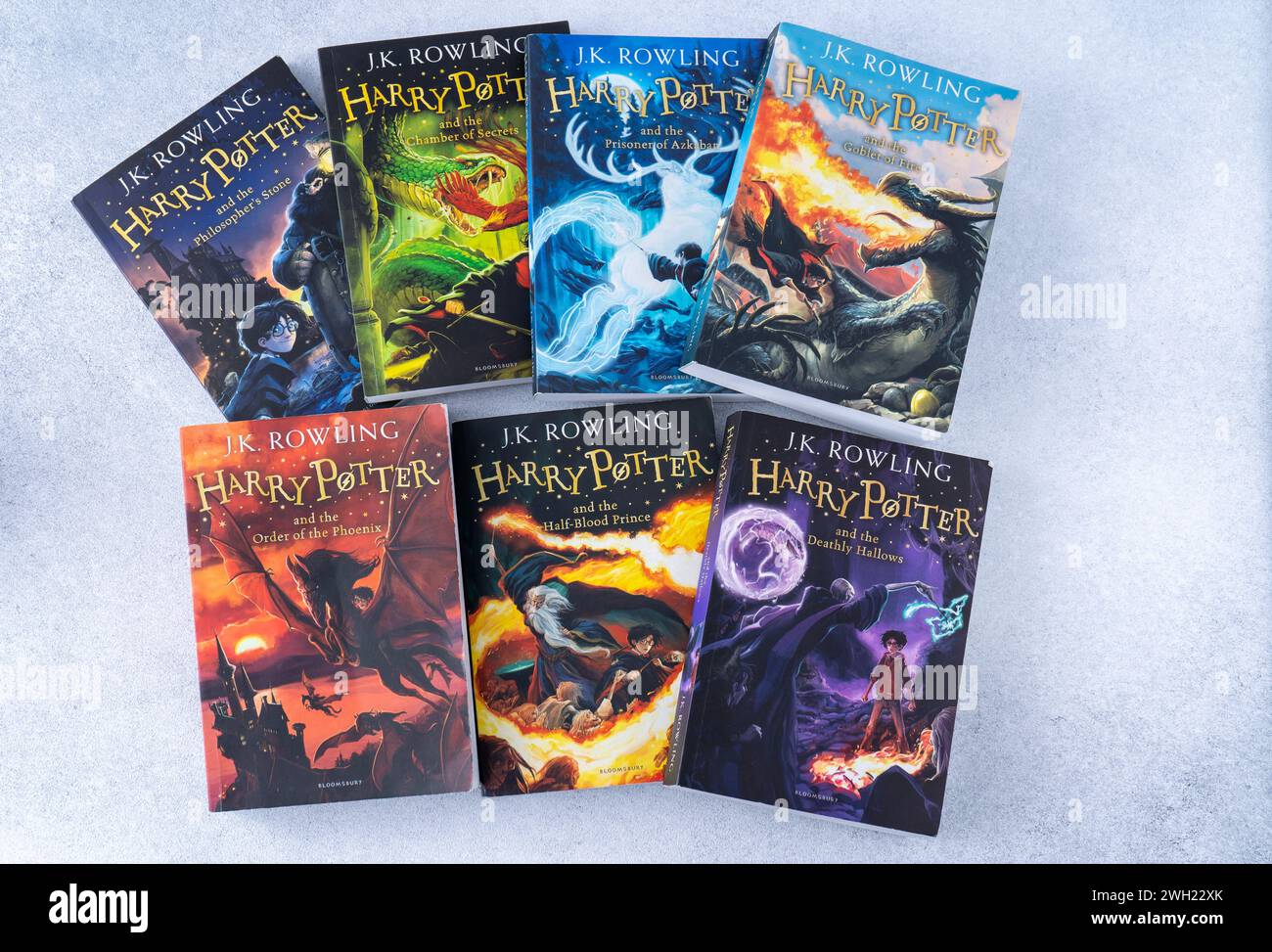 A stack of books about Harry Potter by writer JK Rowling. Collection ...