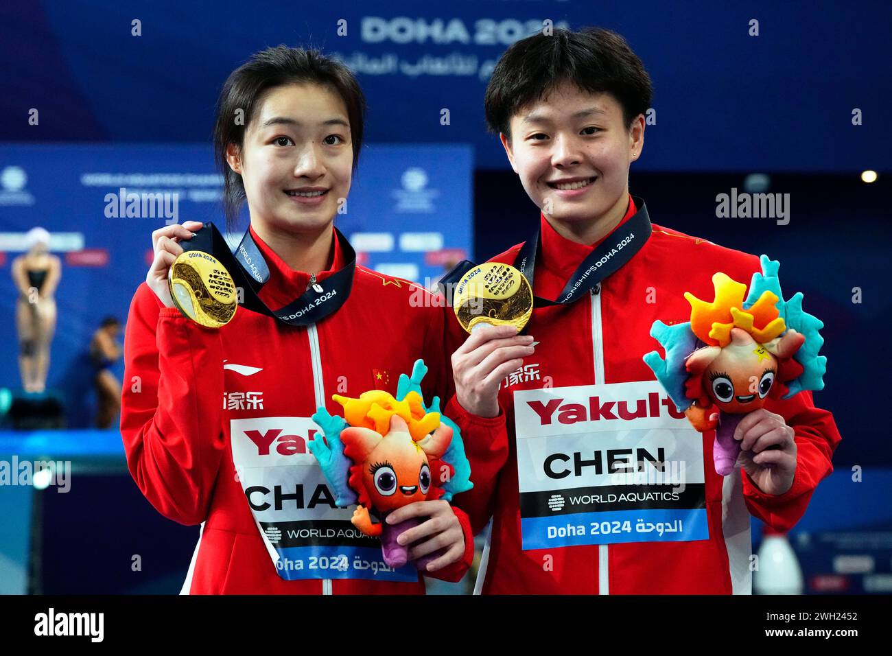 Yani Chang and Yiwen Chen of China pose with their medals after winning the women's synchronized ...