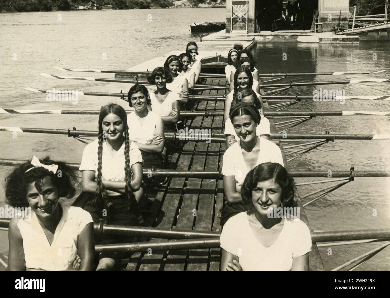 Girls on the rowing boat in the Tiber river, Rome, Italy 1930s Stock ...