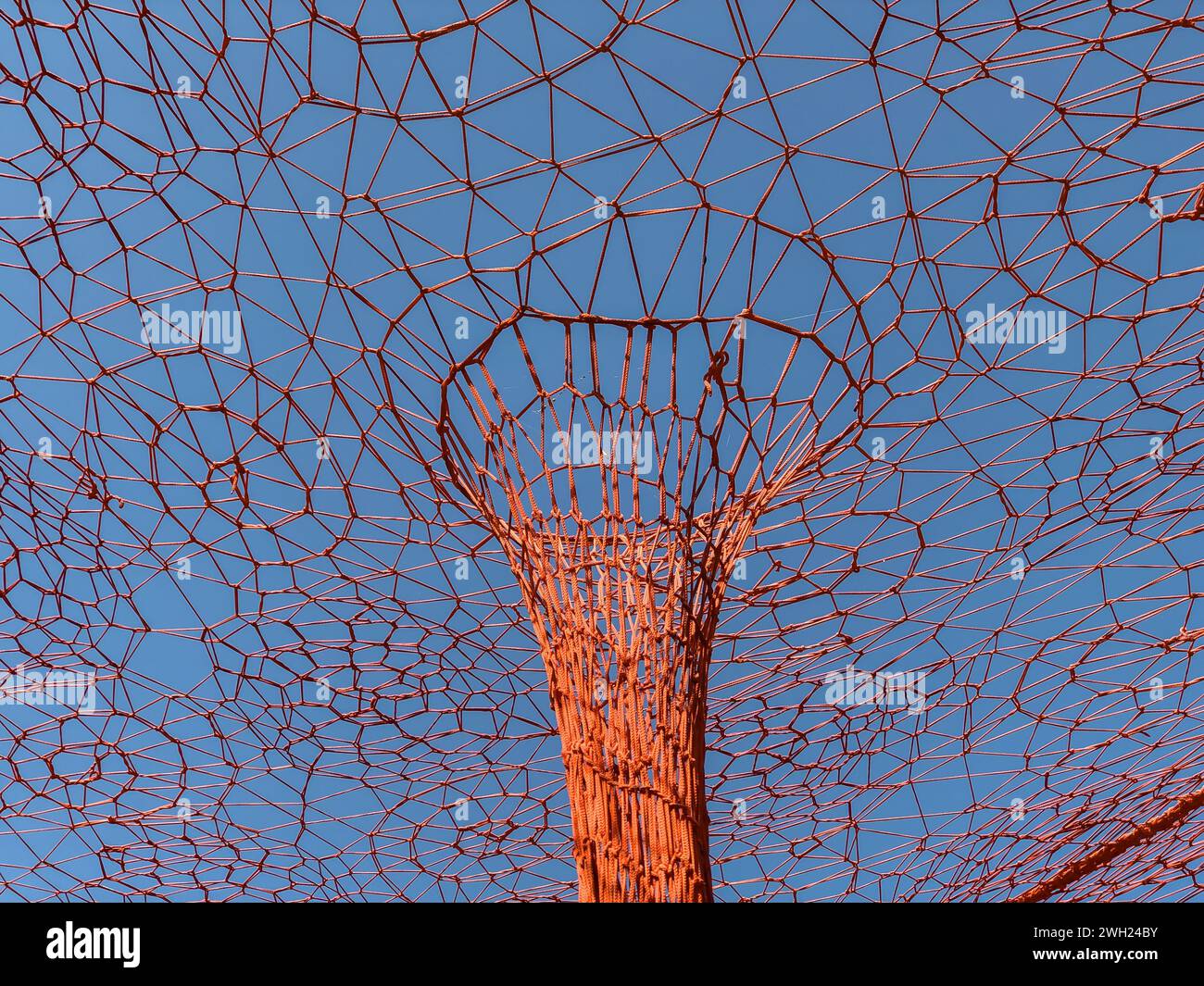 red rope sculpture texture in backyard Stock Photo - Alamy