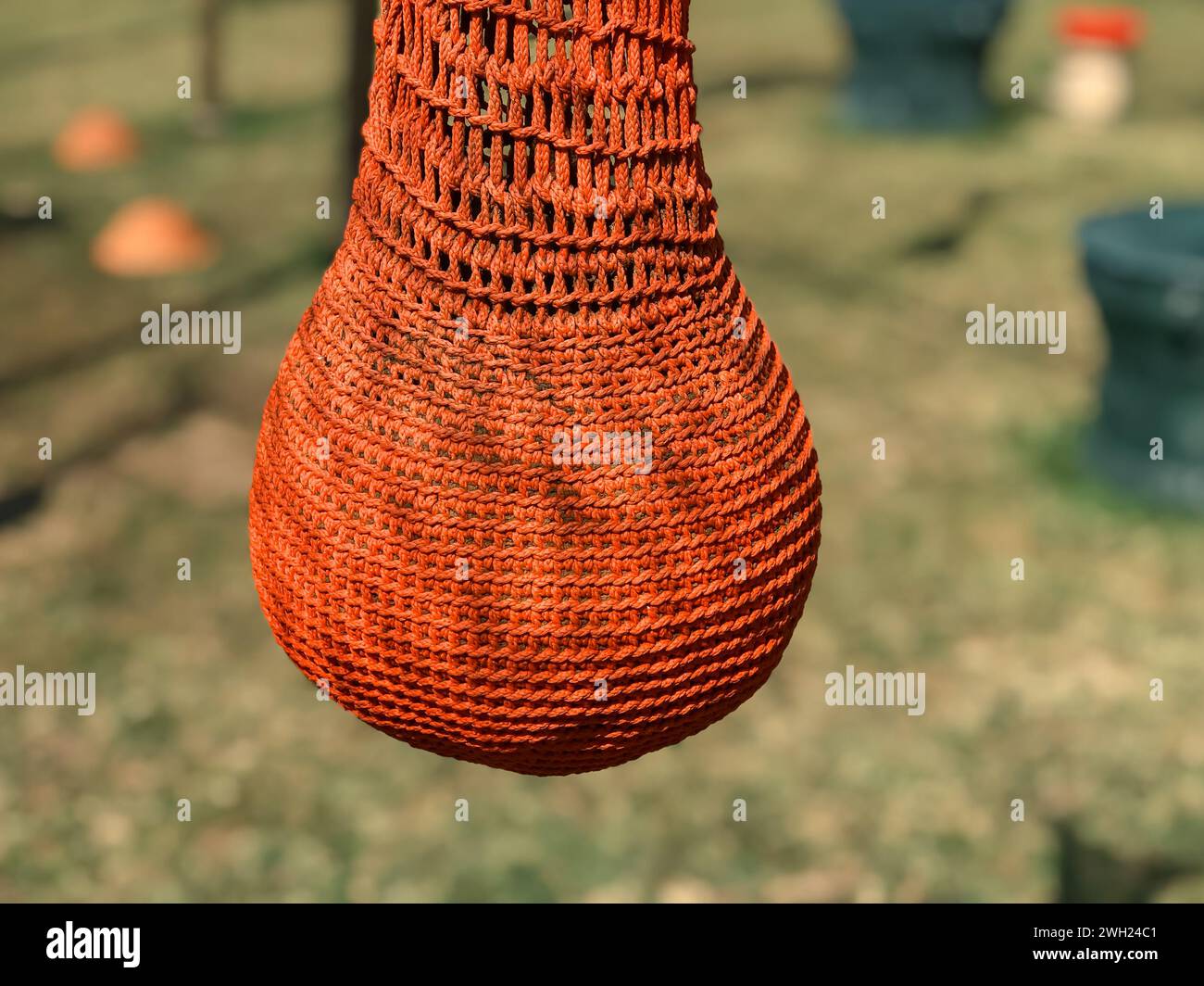 red rope sculpture texture in backyard Stock Photo - Alamy
