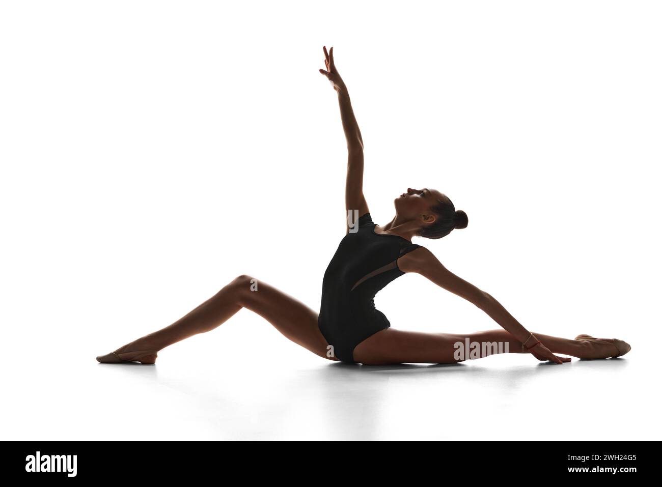 Talent show. Artistic, beautiful, elegant teen girl rhythmic gymnast ...