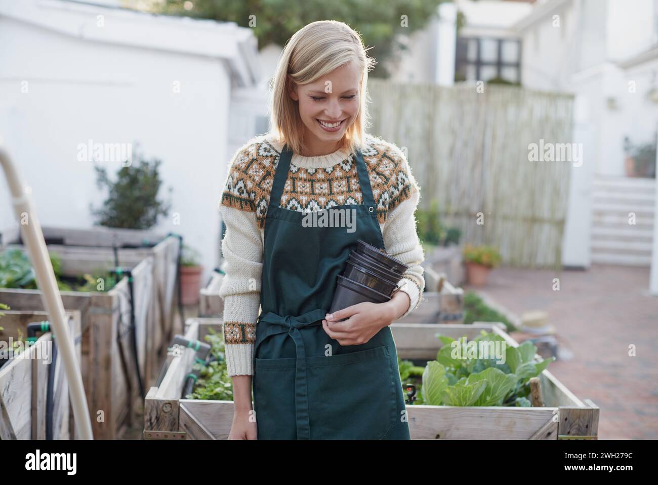 Gardening, seedling and woman with pot for plants for landscaping ...