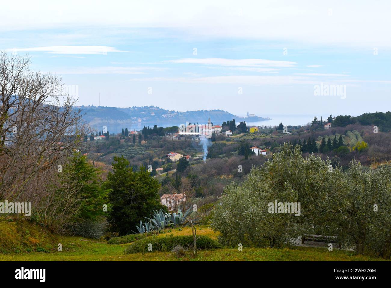 Parish church of the Apparition of Mary in Strunjan on a hill and Piran ...