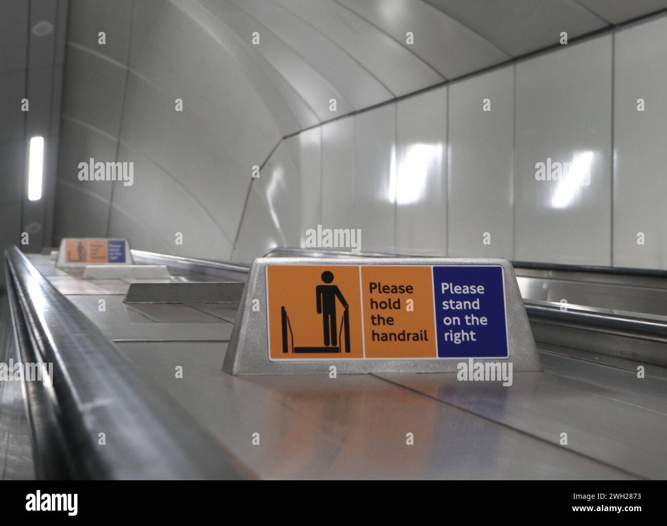 Sign London subway please stand on the right Stock Photo - Alamy