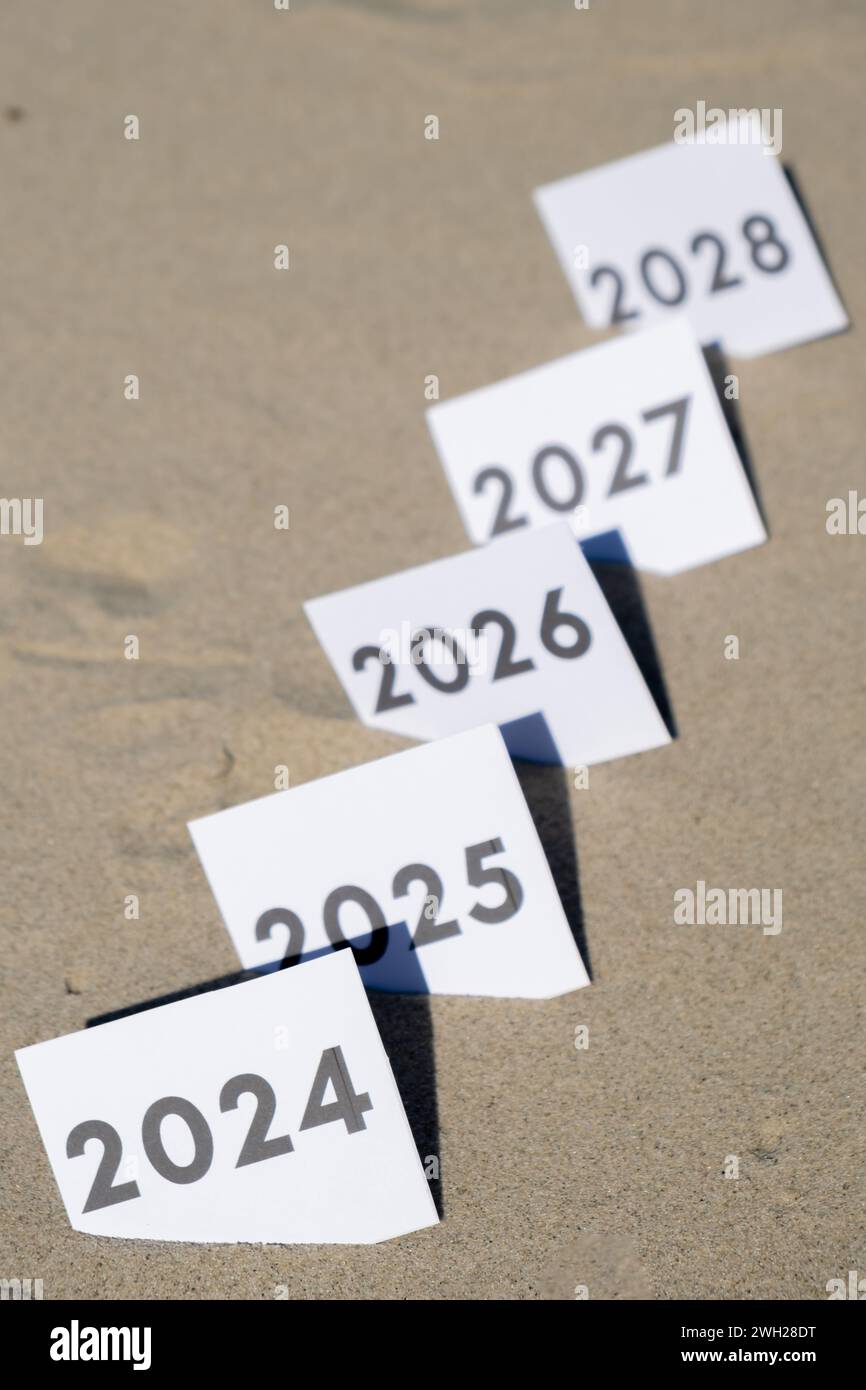 Paper cards with numbers of years from 2024 to 2028 in a row. New year ...