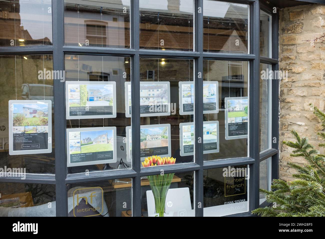 Estate Agent's window with pictures of houses for sale, Tetbury ...