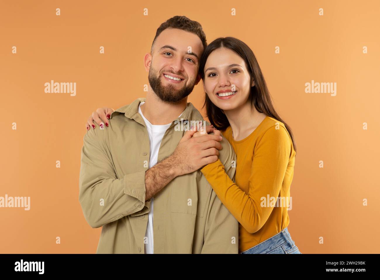 Beautiful family couple hugging enjoying hi-res stock photography and ...