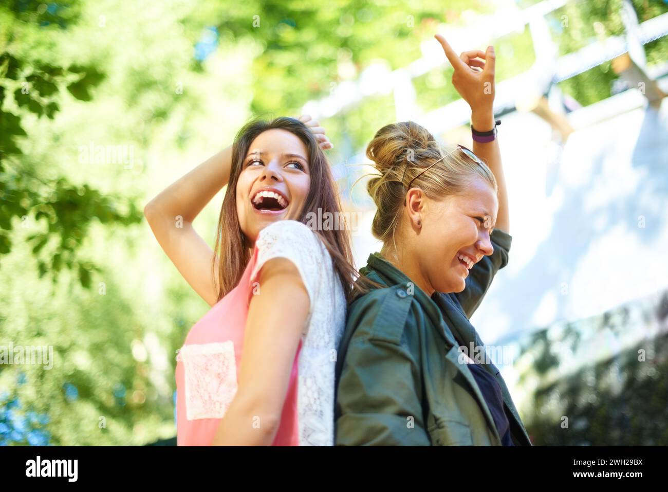 Friends, excited and women dance at music festival outdoor, bonding and ...