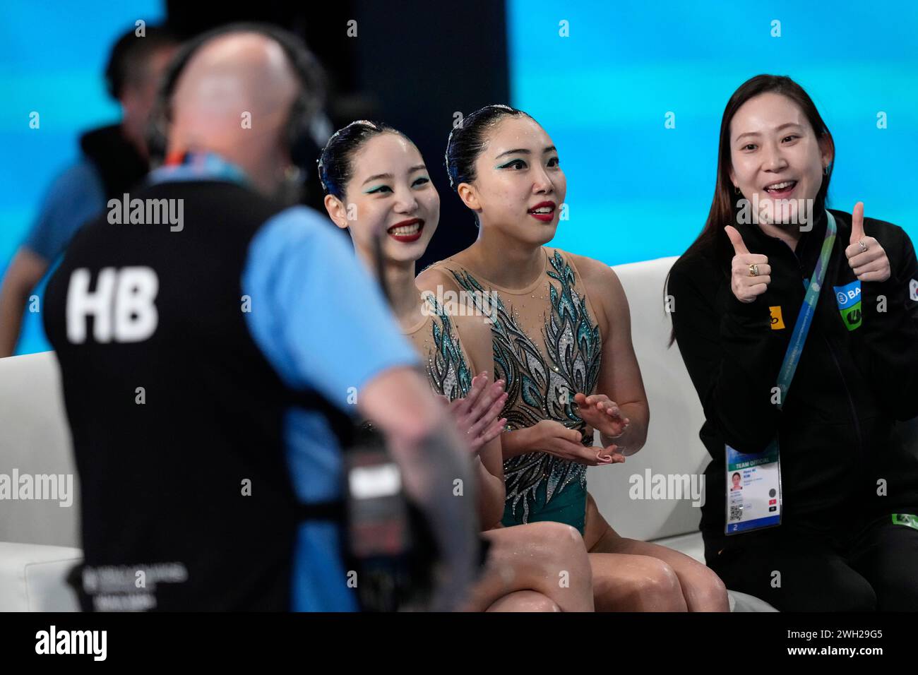 Her Yoon-seo and Lee Ri-young of South Korea react after competing the ...