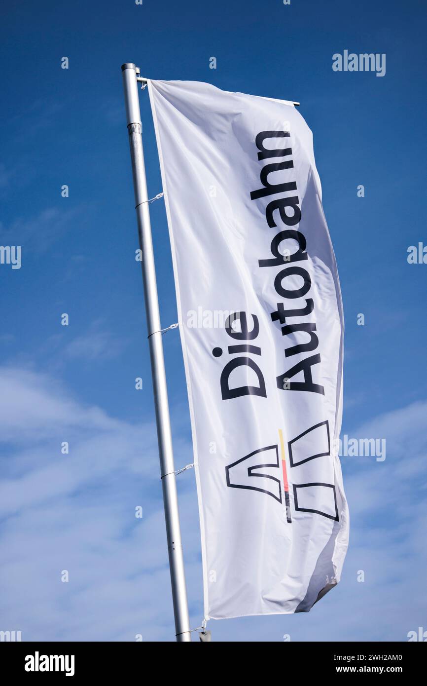 Hohen Neuendorf, Germany. 07th Feb, 2024. A flag with the company logo ...