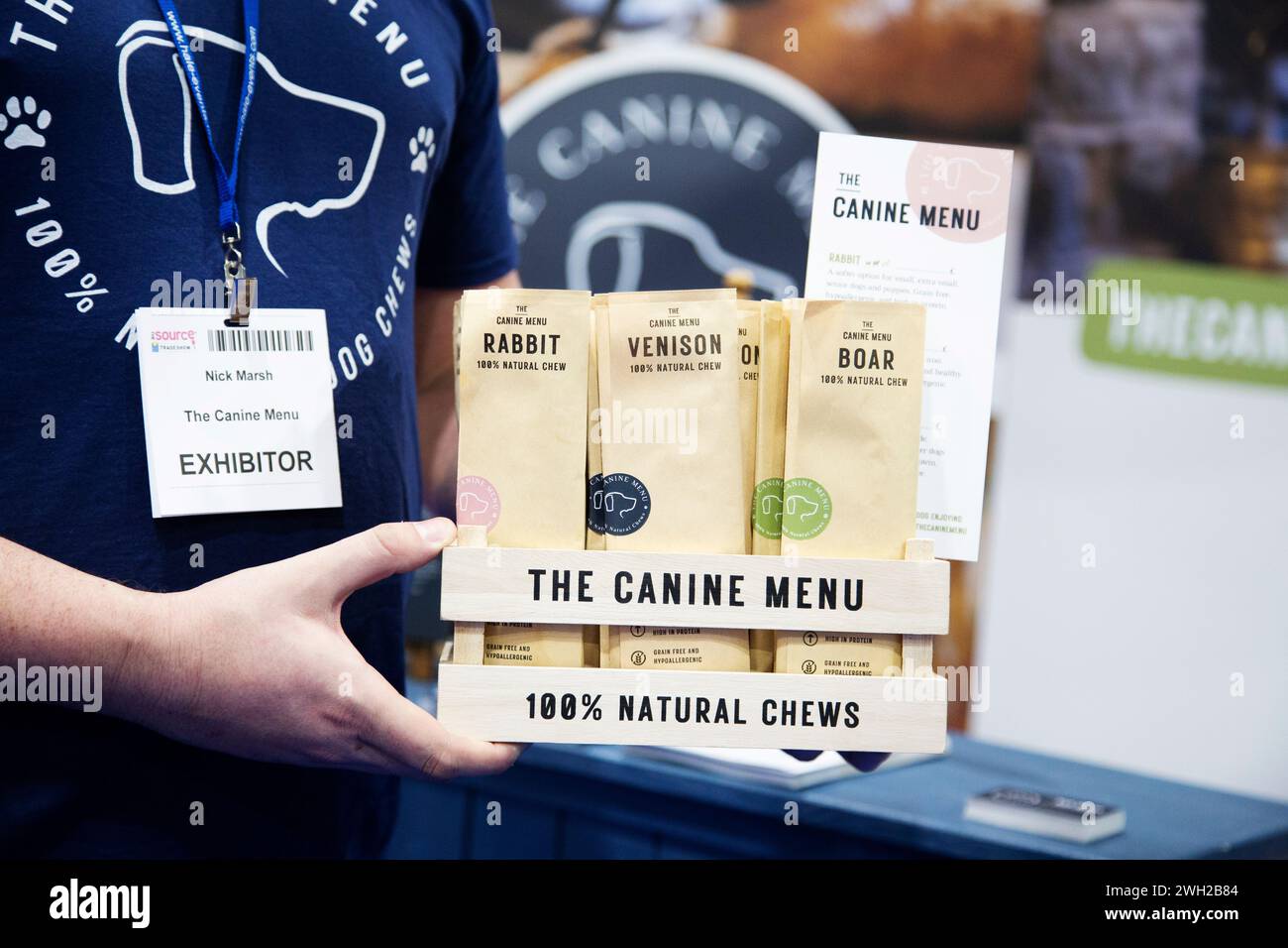 Portrait of male rep' at 'The Canine Menu' exhibition stand at the ...