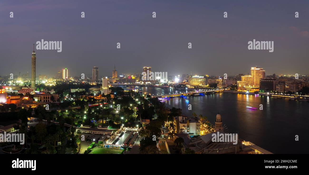 Aerial view of Cairo tower and the Nile river at night in Cairo, Egypt ...