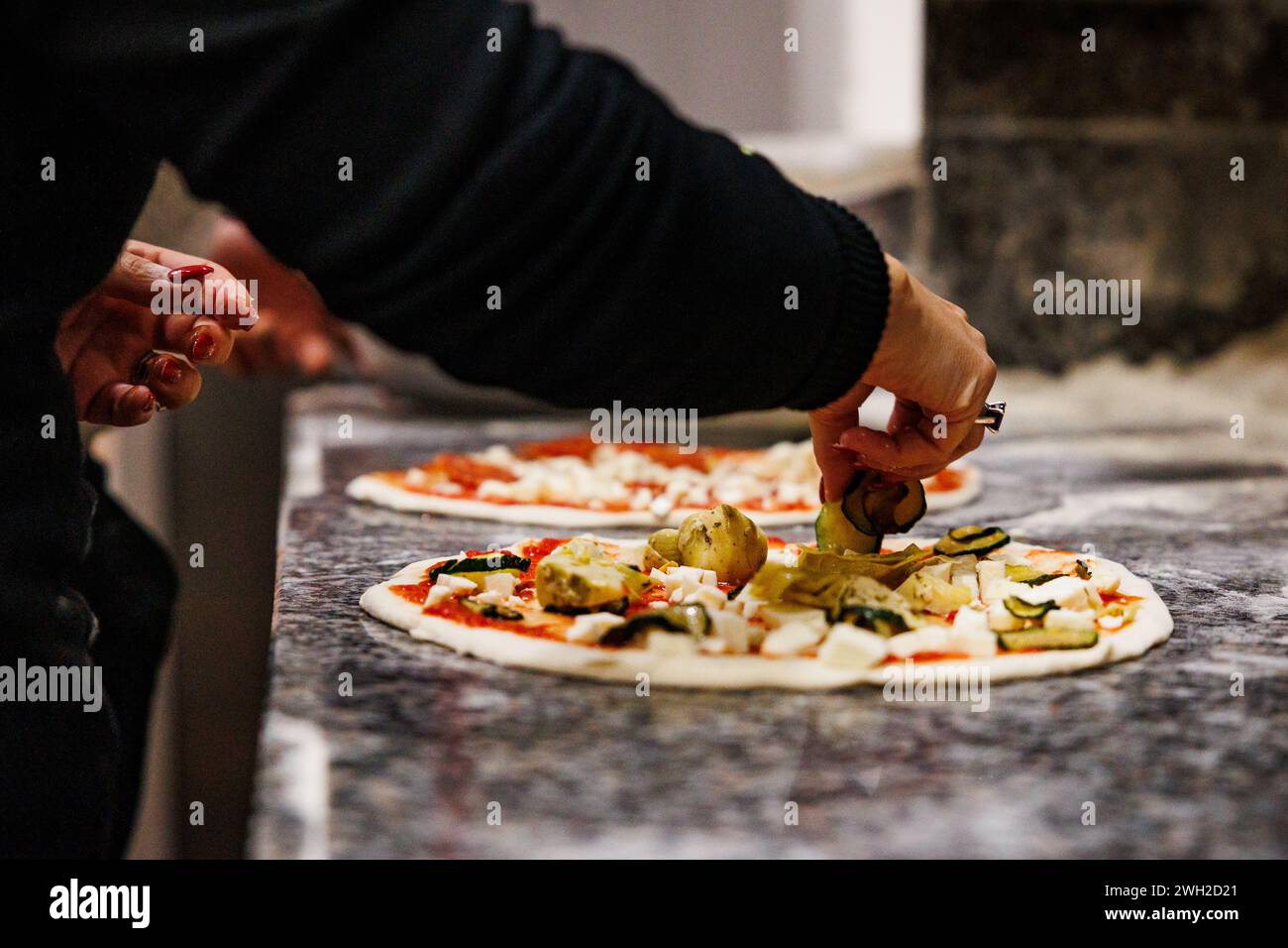 Experiencing making own pizza, demonstration about pizza, in Italy ...