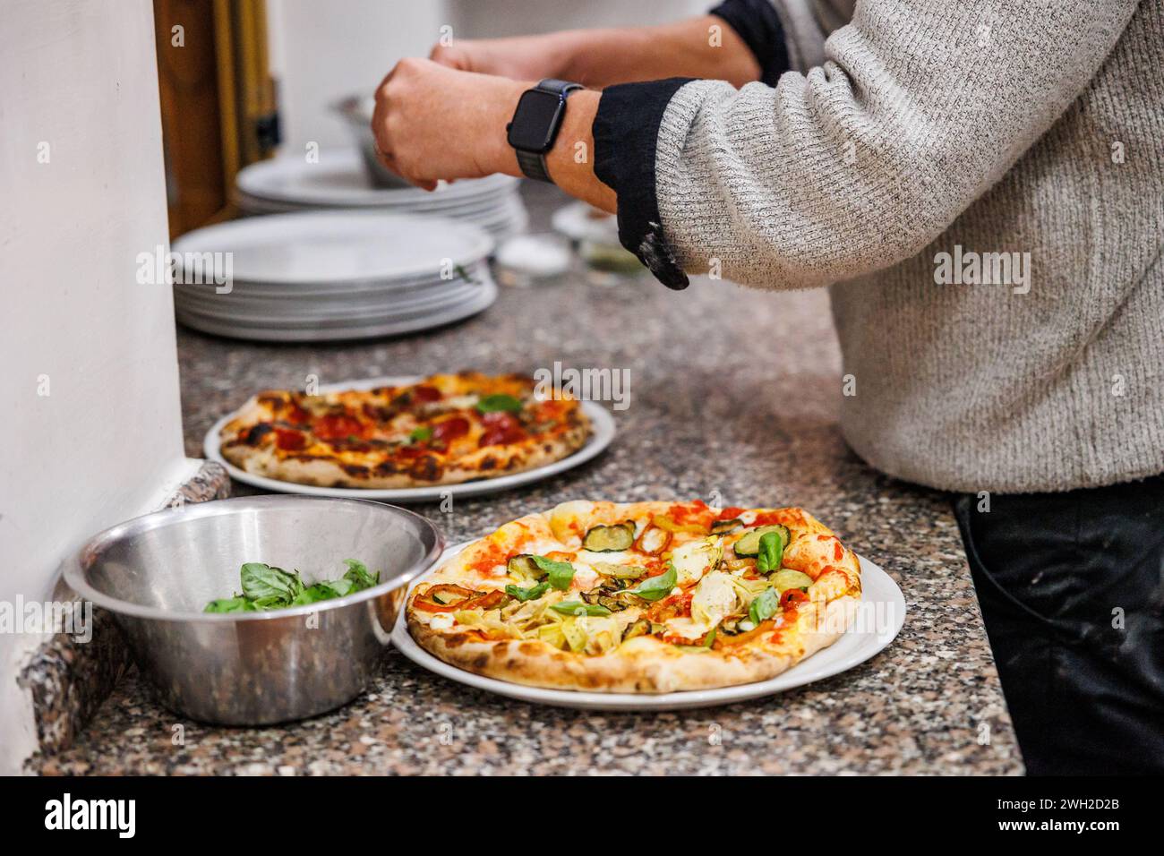 Experiencing making own pizza, demonstration about pizza, in Italy ...
