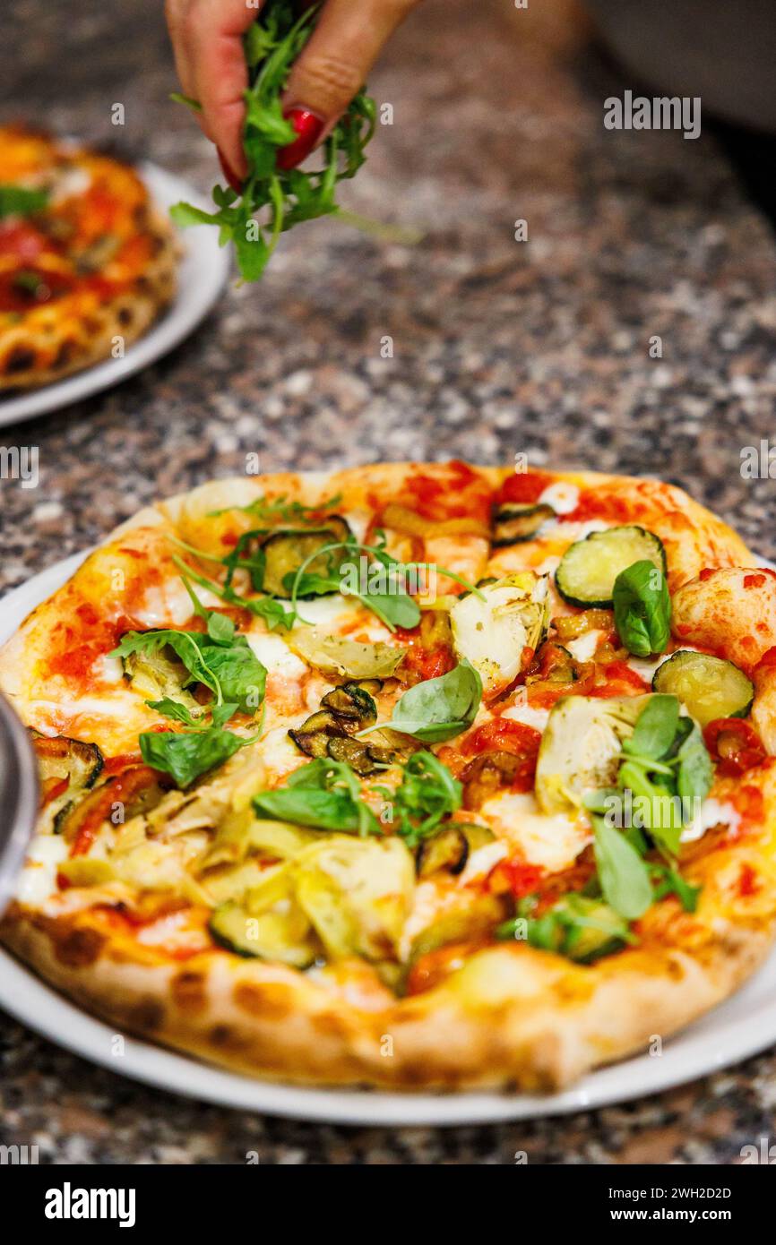 Experiencing making own pizza, demonstration about pizza, in Italy ...