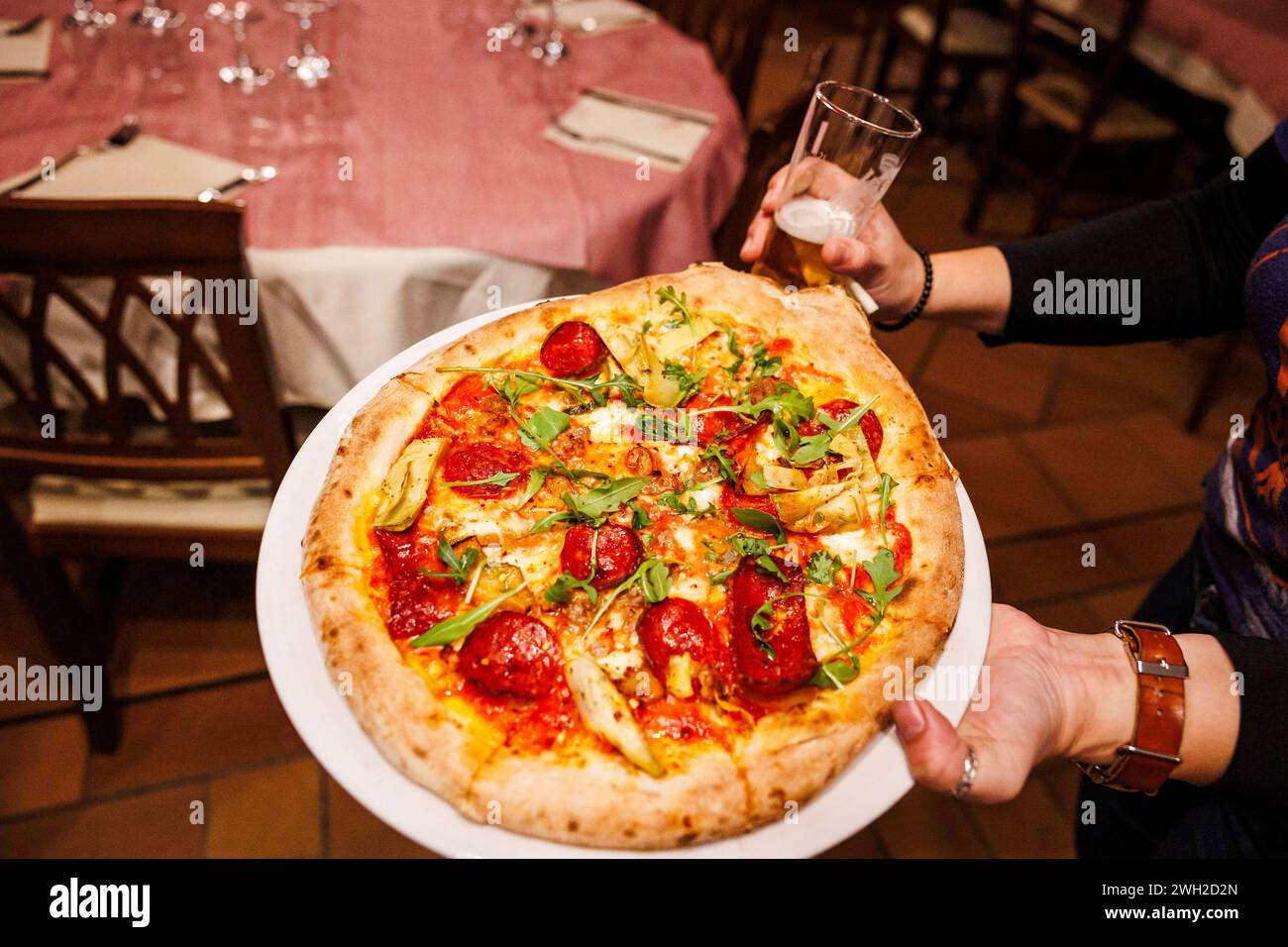 Experiencing making own pizza, demonstration about pizza, in Italy ...