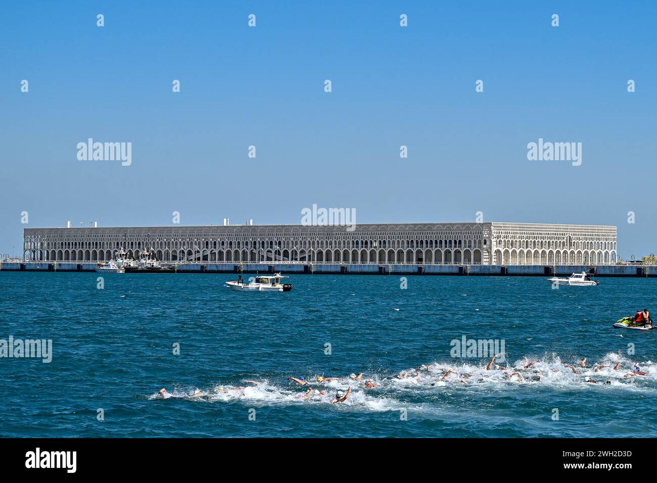 Doha, Qatar. 07th Feb, 2024. Athletes compete in the open water 5km ...