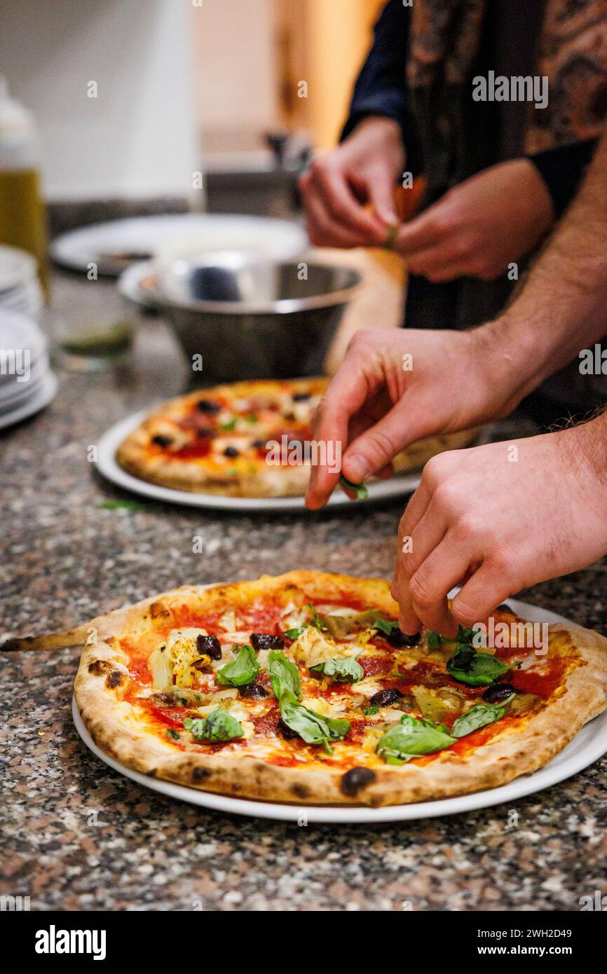 Experiencing making own pizza, demonstration about pizza, in Italy ...