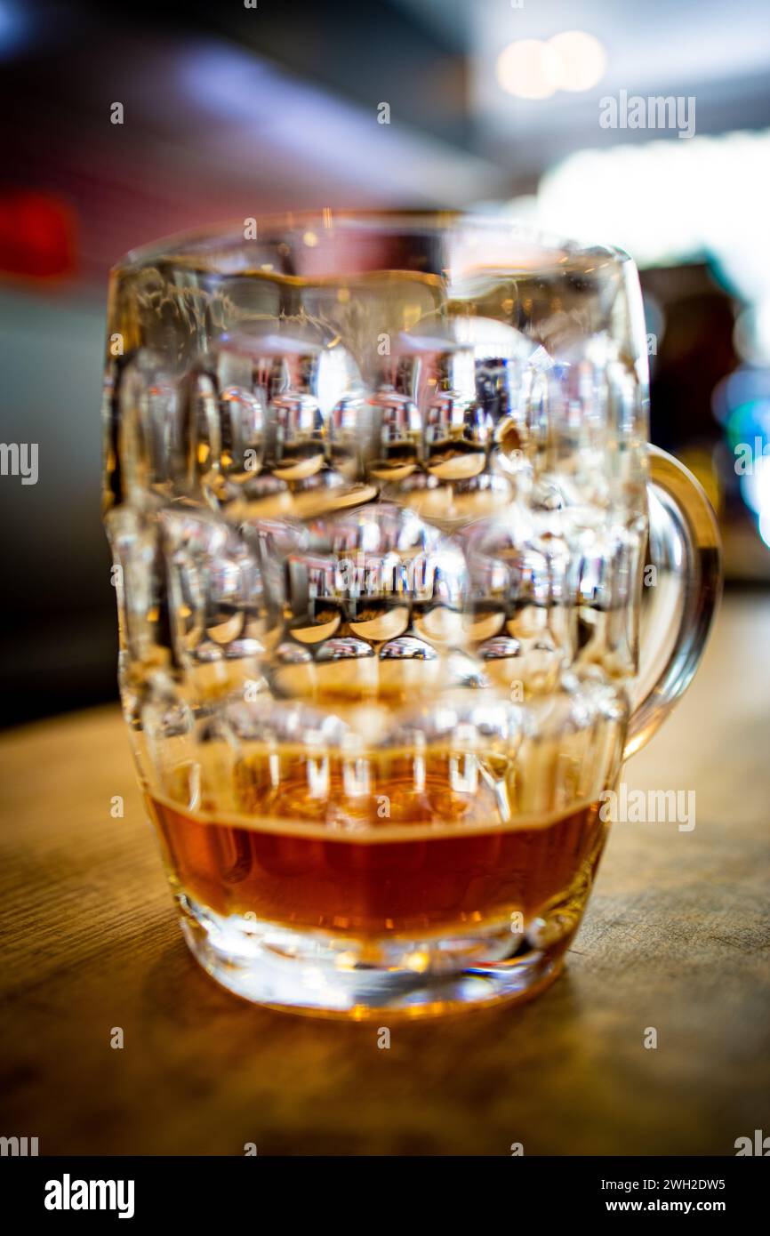 Berr glass, almost empty, alcohol, alcoholism, 2024 Stock Photo - Alamy