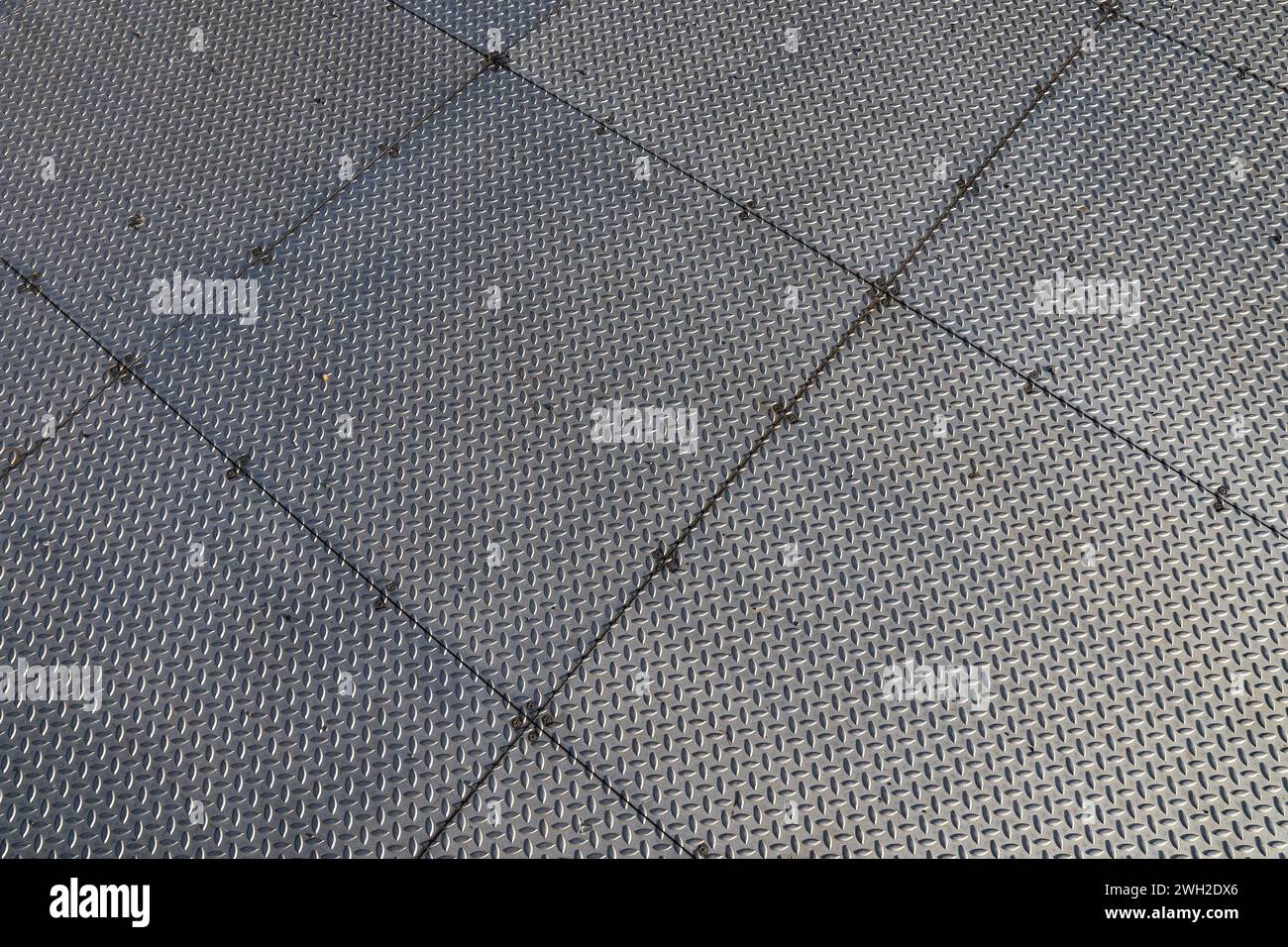 Diamond plate metal floor background. Industrial factory steel surface ...