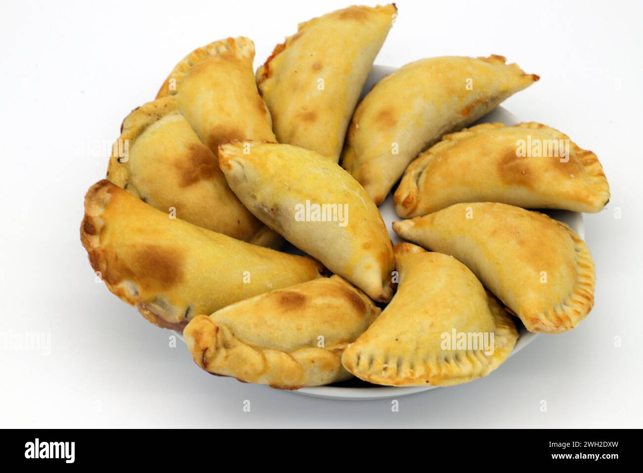 Plate of Empanadas on white background Stock Photo - Alamy
