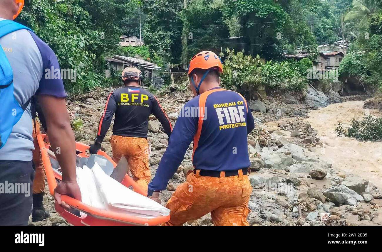 (240207) -- MANILA, Feb. 7, 2024 (Xinhua) -- Rescuers work at the site of a landslide in Davao ...