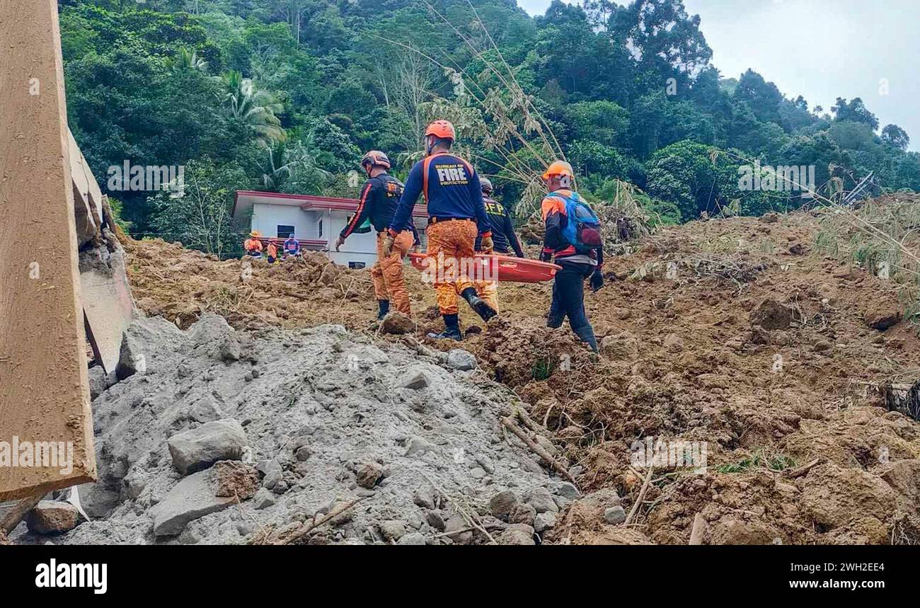 (240207) -- MANILA, Feb. 7, 2024 (Xinhua) -- Rescuers work at the site of a landslide in Davao ...