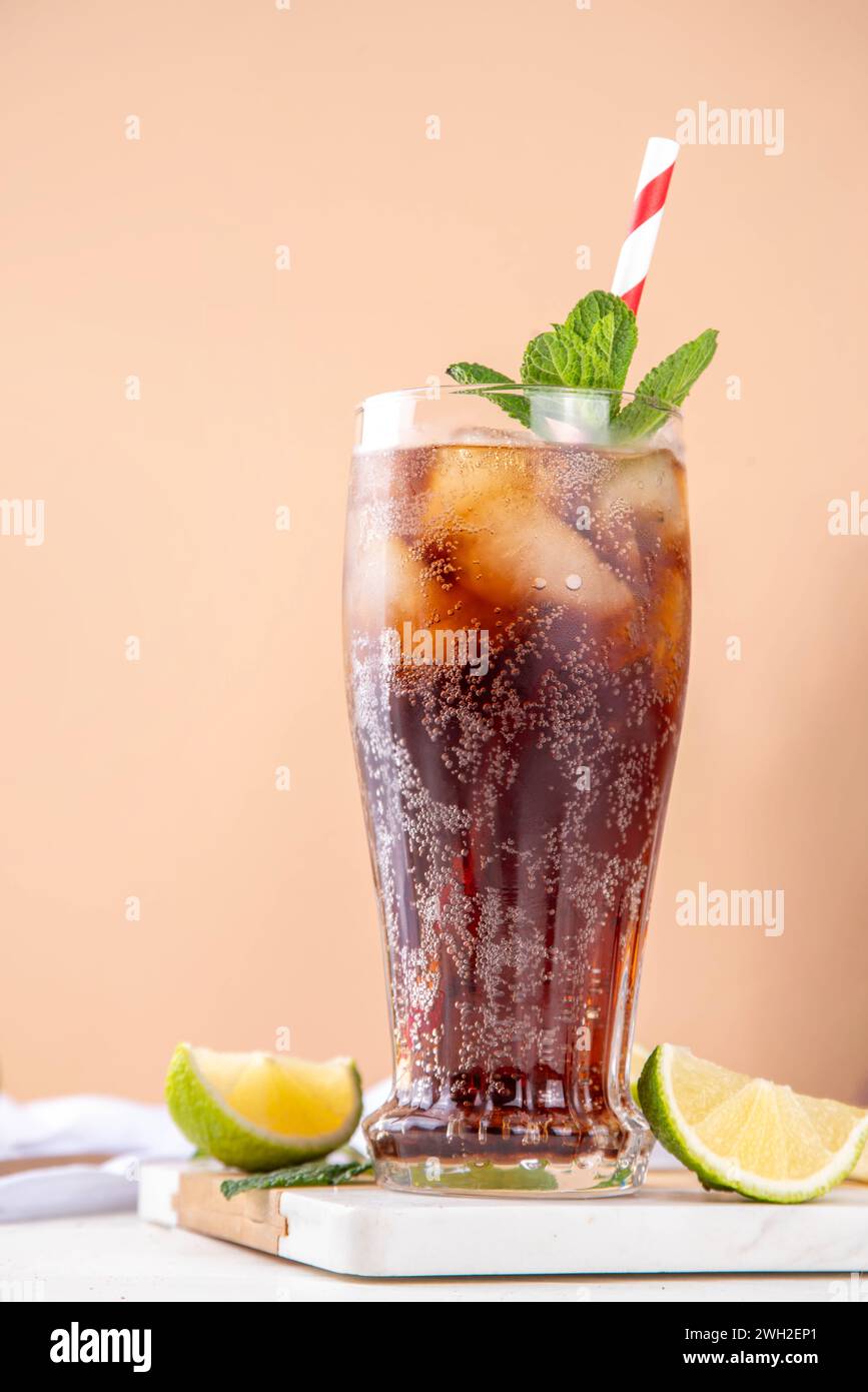 Cuba Libre or long island iced tea cocktail with strong drinks, cola ...
