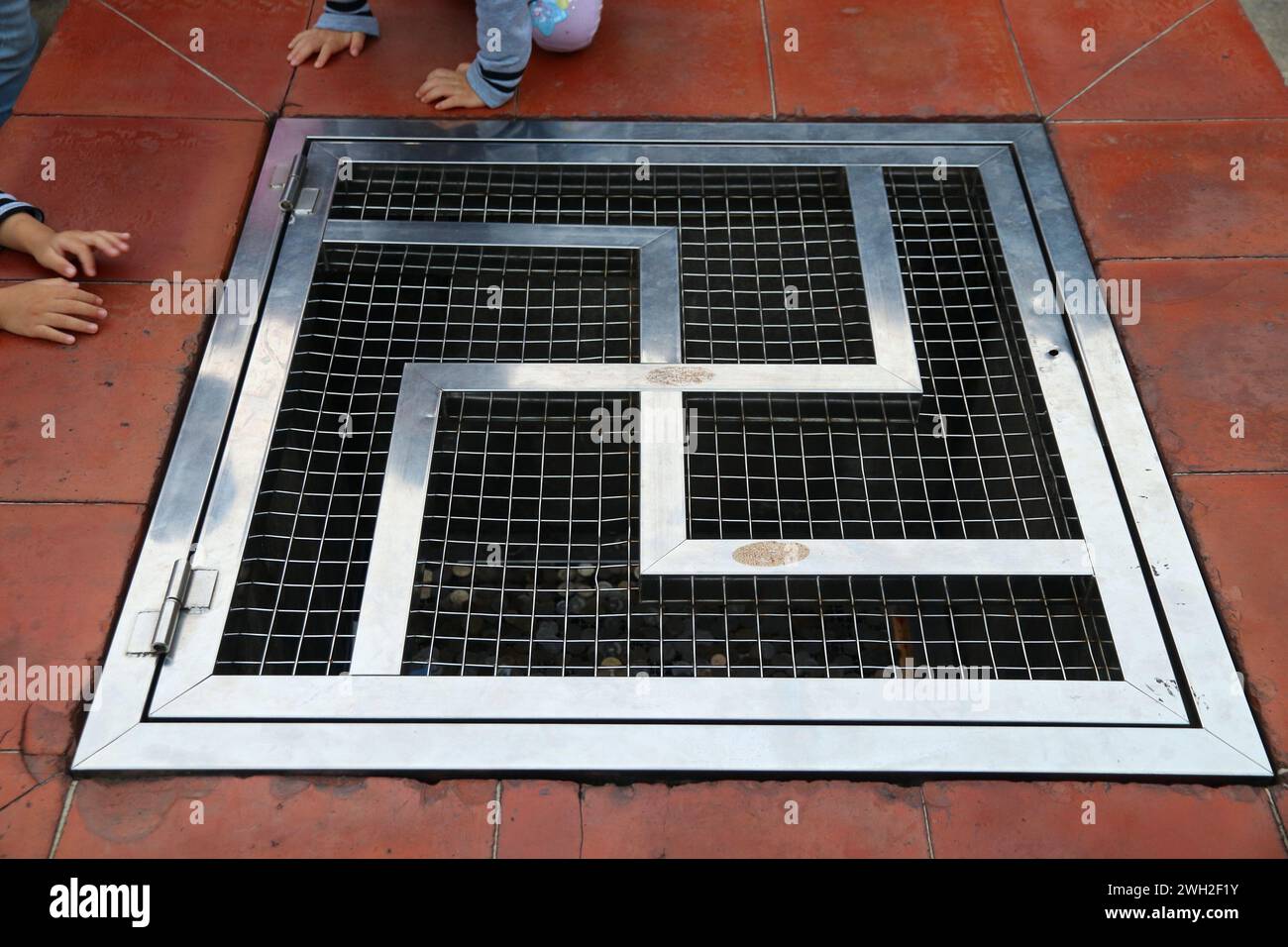 Lukang Old Town, Taiwan. Temple money collection box in the floor ...