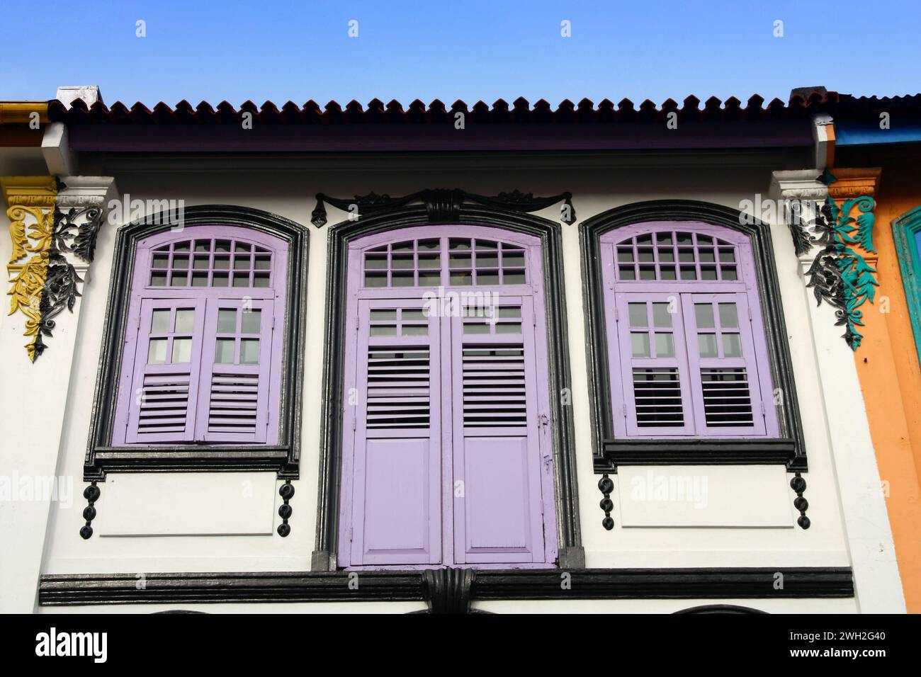 Singapore Chinatown - old colonial architecture. Colorful windows of ...