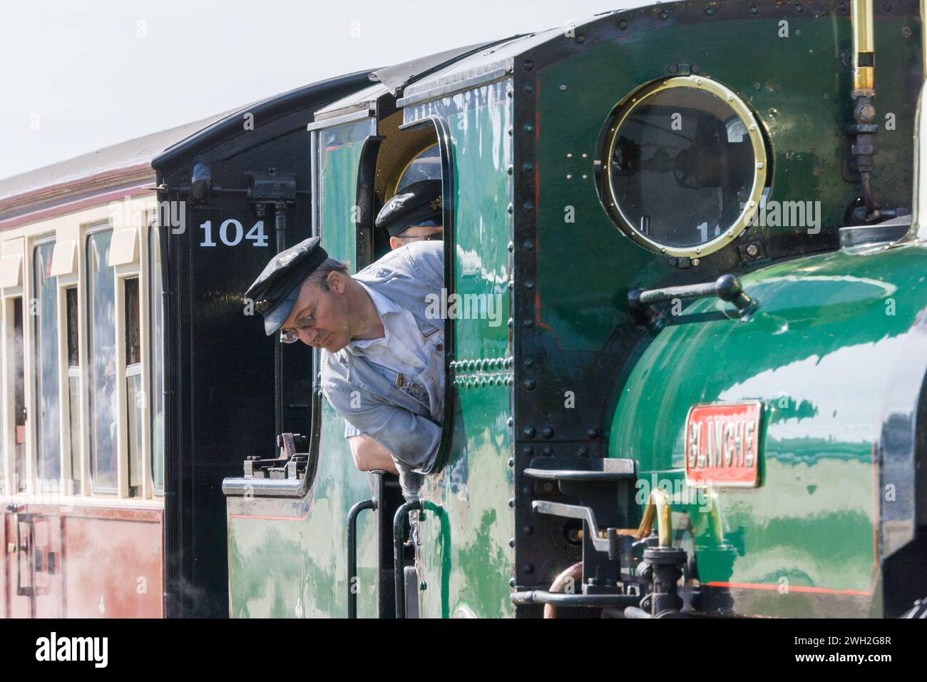 A narrow gauge steam train on the Ffestiniog railway at Portmadog Stock ...