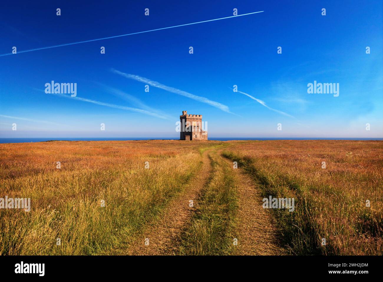 The castellated signal tower on the Cliff Walk around Ardmore Head ...