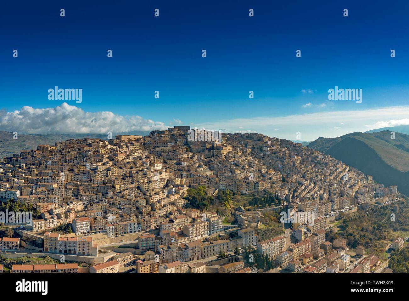 A drone perspective of the landmark hilltop town of Gangi in central ...