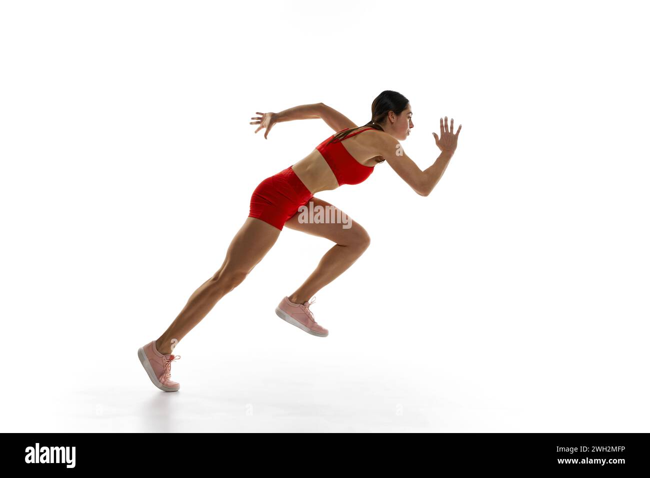 Dynamic side view image of competitive woman in red sportswear, runner ...