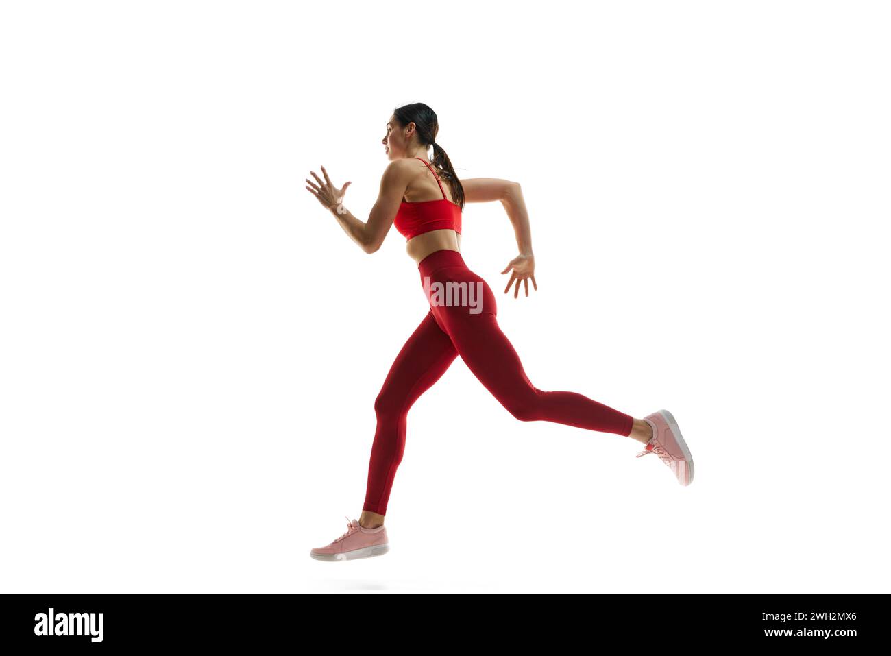 Dynamics, endurance and energy. Female runner athlete in motion ...