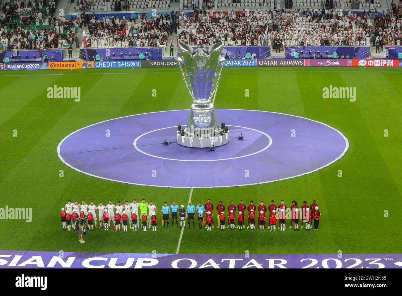 Iran and Qatar squad line up for anthems before the Asian Cup semifinal ...