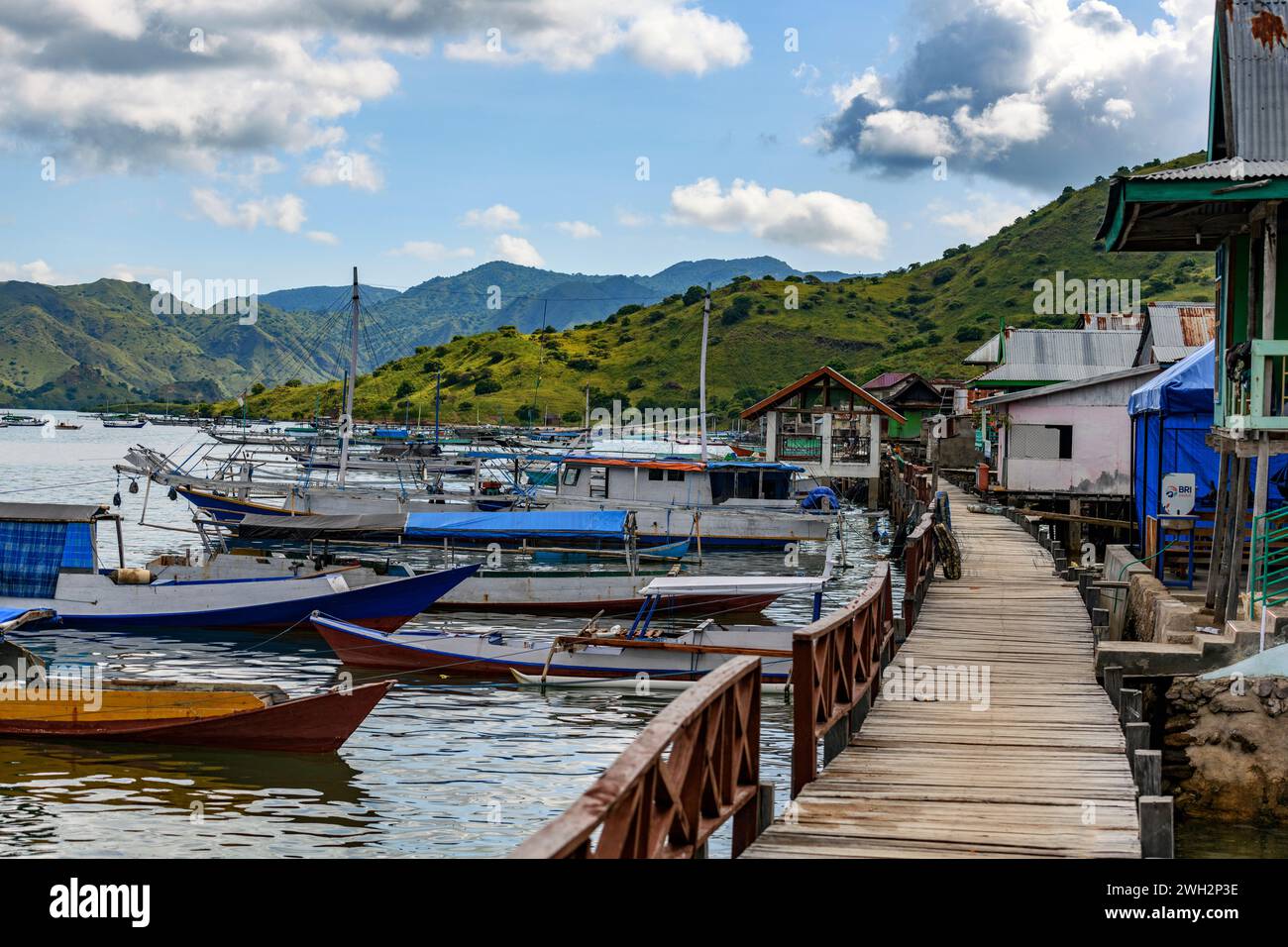 Walkway and local boats in Komodo Village (Komodo Island, East Nusa ...