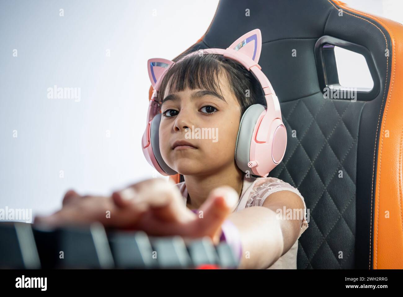 Portrait of a gamer girl playing on the computer in the bedroom Stock ...